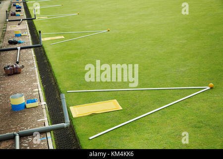 A lawn bowls mat and ball on the lawn Stock Photo - Alamy