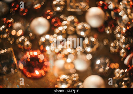 Gold blurred abstract bokeh light backgound form streamer in christmas ...
