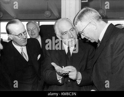 This image features Niels Bohr, a renowned physicist known for his ...