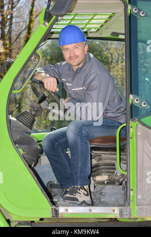 modern industrial machine operator posing smiling Stock Photo - Alamy