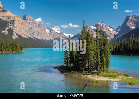 Beautiful view of Spirit island with canoe and dramatic sky on autumn ...
