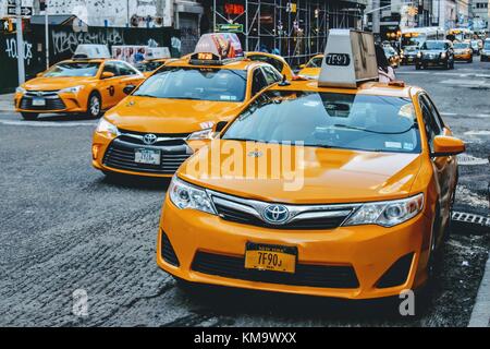 Yellow cabs in New York City, USA Stock Photo - Alamy