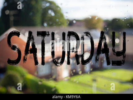 Text sign showing Saturday. Word for First day of the weekend Relaxing ...