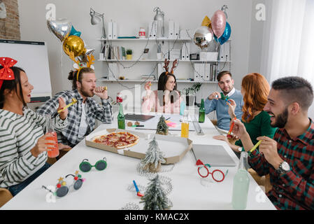 Employees partying at the office Stock Photo - Alamy