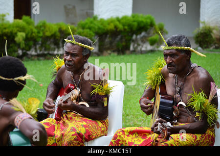 Islanders singing and playing musical instruments taken at Papua New ...