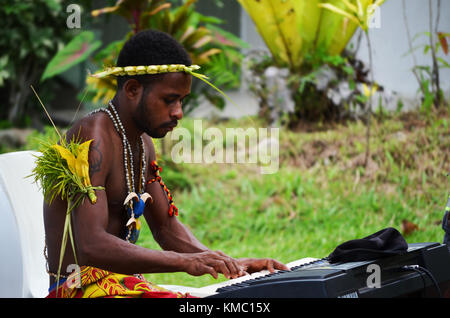 Islanders singing and playing musical instruments taken at Papua New ...