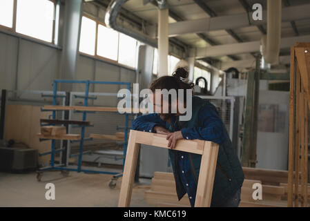 Carpenter making a frame Stock Photo - Alamy