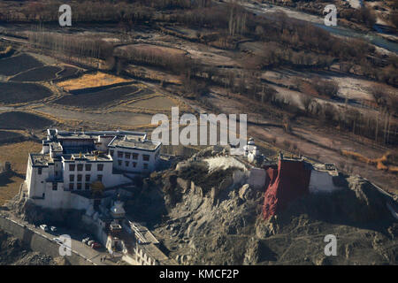 White buildings of the Buddhist monastery Spituk (Petub) Gonpa on the ...