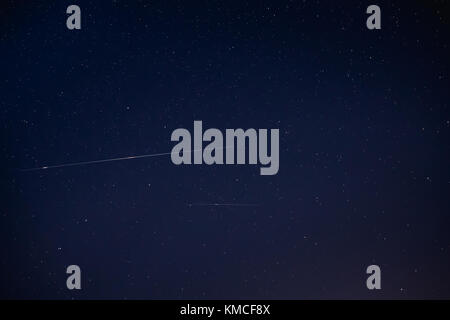 Two Meteoric Tracks In The Blue Night Starry Sky Background. Natural ...