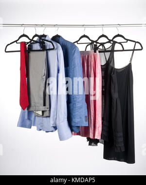 Female clothes on hangers in wardrobe Stock Photo - Alamy
