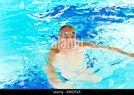 A fat man in a swimming pool Stock Photo: 67946613 - Alamy