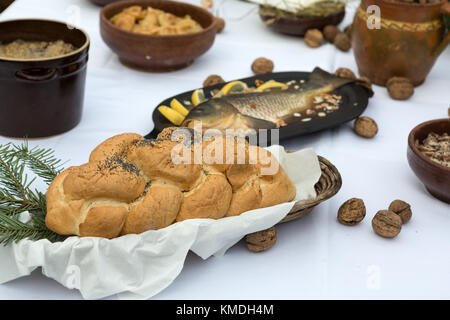 Bread and carp on Chistmas table Stock Photo - Alamy