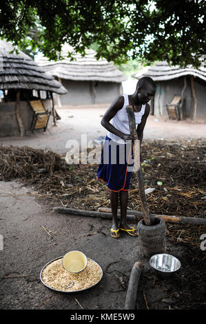 SOUTH SUDAN, Lakes State, village Mapuordit, Dinka family with child ...