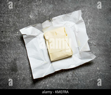 Cut block of butter on stone board Stock Photo - Alamy