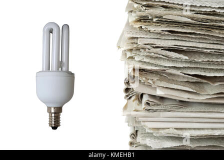 Light bulb and newspapers isolated on white background Stock Photo - Alamy