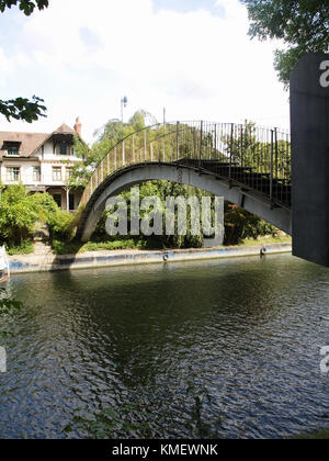 Bridge over river to Eyot House located on D'Oyly Carte Island on bank ...