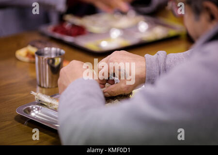 A person is having lunch at a cafeteria for poor people Stock Photo - Alamy