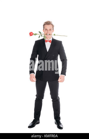 stylish man with rose in teeth Stock Photo - Alamy