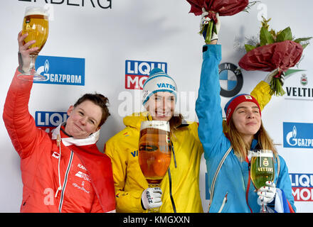 Skeleton pilot Jacqueline Loelling of Germany cheers after winning 1st ...
