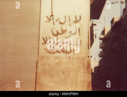 This image depicts the aftermath of the Hama Massacre, which occurred ...