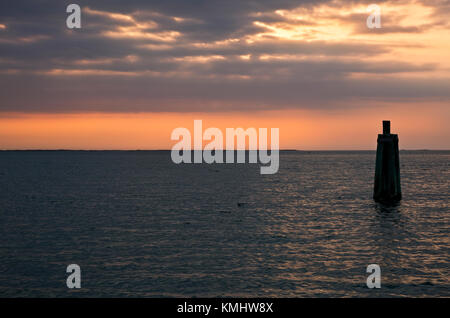Cape Lookout Lighthouse with ferry dock on Harkers Island, North ...