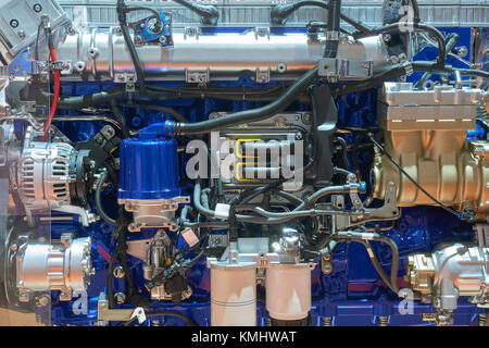 Side view of the diesel engine of a blue Fordson Major tractor Stock ...