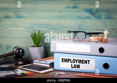 employment law concept. Binders on desk in the office. Business ...