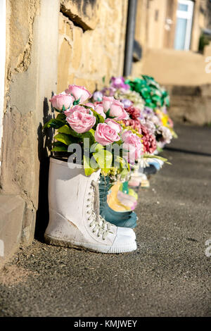 Flowers in Wellies - Original Garden Ideas Stock Photo - Alamy