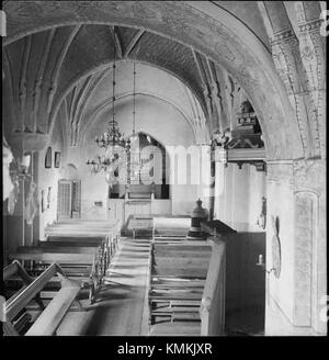 A photograph of Tveta Church, a historical Swedish church known for its ...
