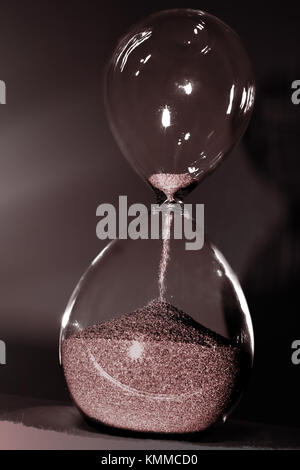 Hourglass on color background, closeup. Time management concept Stock ...