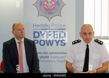 Detective Chief Inspector Martin Slevin of Dyfed-Powys Police reads a ...