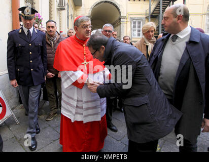 Cardinal Crescenzio Sepe , Archbishop of Naples holds a vial said to ...