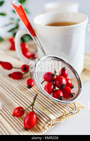canina rosa healing tea with ripe red berries / rose hip drink ...