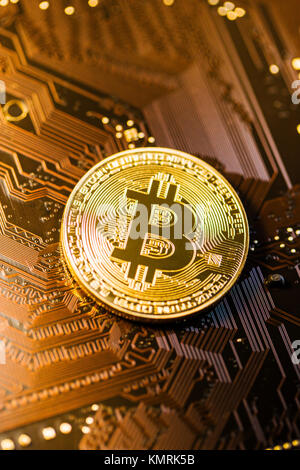 Bitcoins on the motherboard. Crypto currency Gold Bitcoin - BTC - Bit Coin Stock Photo - Alamy