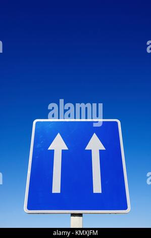 Road sign with two one way signs indicating opposite directions Stock ...