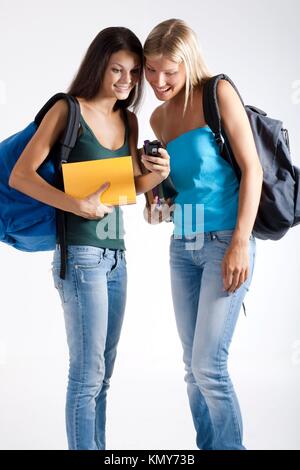 Happy students with book get ready for school exam or lesson. Smiling ...