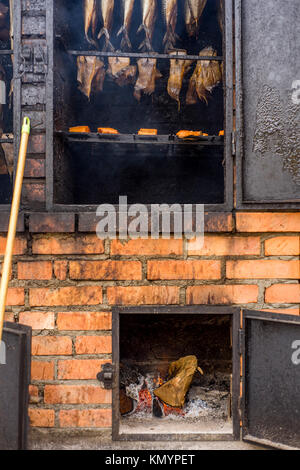 Fish is smoked in a smoker, Mielno, Poland 2018 Stock Photo - Alamy