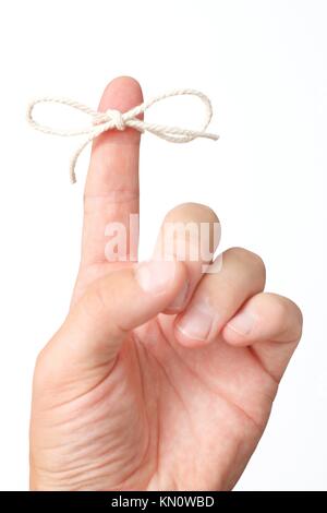 Remember knot and reminder symbol as a string tied on a finger to ...