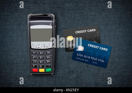 Payment terminal with credit cards on white background Stock Photo - Alamy