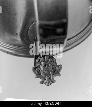 This silver chafing dish by John Burt (1740–1745) demonstrates fine ...
