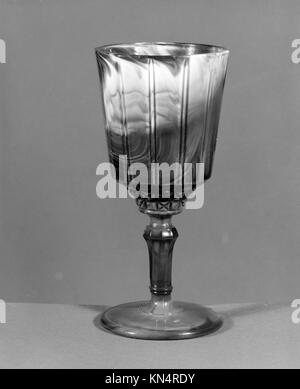 This goblet, part of the MET collection, features intricate design ...