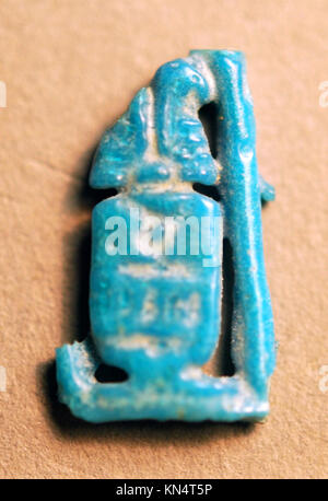 This fragmentary cartouche amulet features ancient Egyptian symbols ...