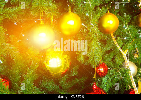 decorated christmas fir tree with flares Stock Photo - Alamy