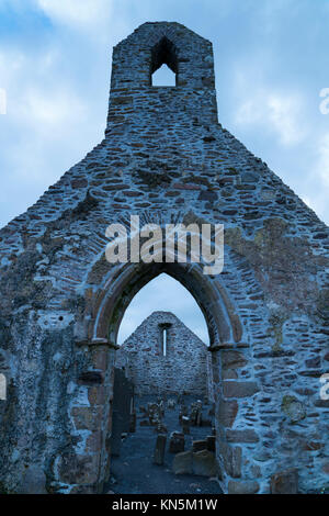 Ballinskelligs Priory on the coast at Ballinskelligs, County Kerry ...