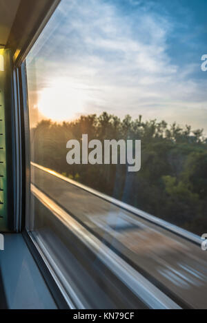 Carriage and track seen through window of train Stock Photo - Alamy