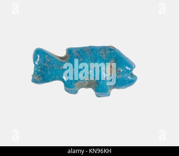 This fish-shaped amulet illustrates ancient craftsmanship, symbolic ...