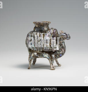 This animal flask, crafted from ceramic, features a detailed animal ...