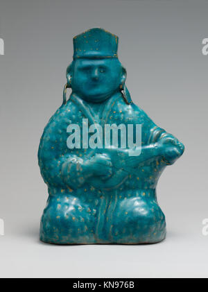 This bottle, designed in the form of a lute player, is a unique art ...