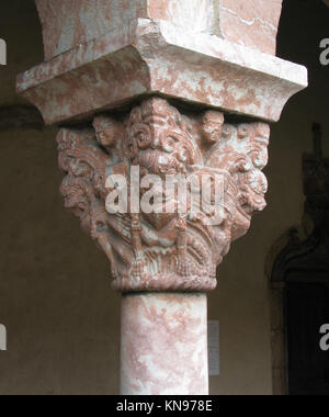 This capital features decorative carvings typical of medieval ...
