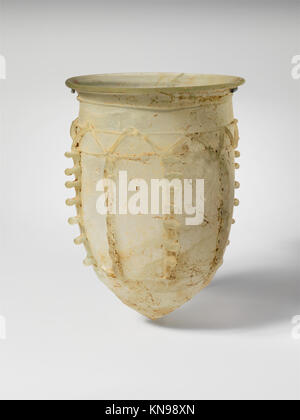 This beaker is a vessel used for drinking or ceremonial purposes. Its ...